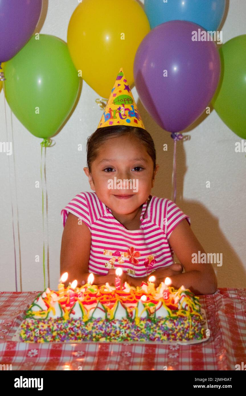 Native American girl celebrates her birthday party with a decorated ...