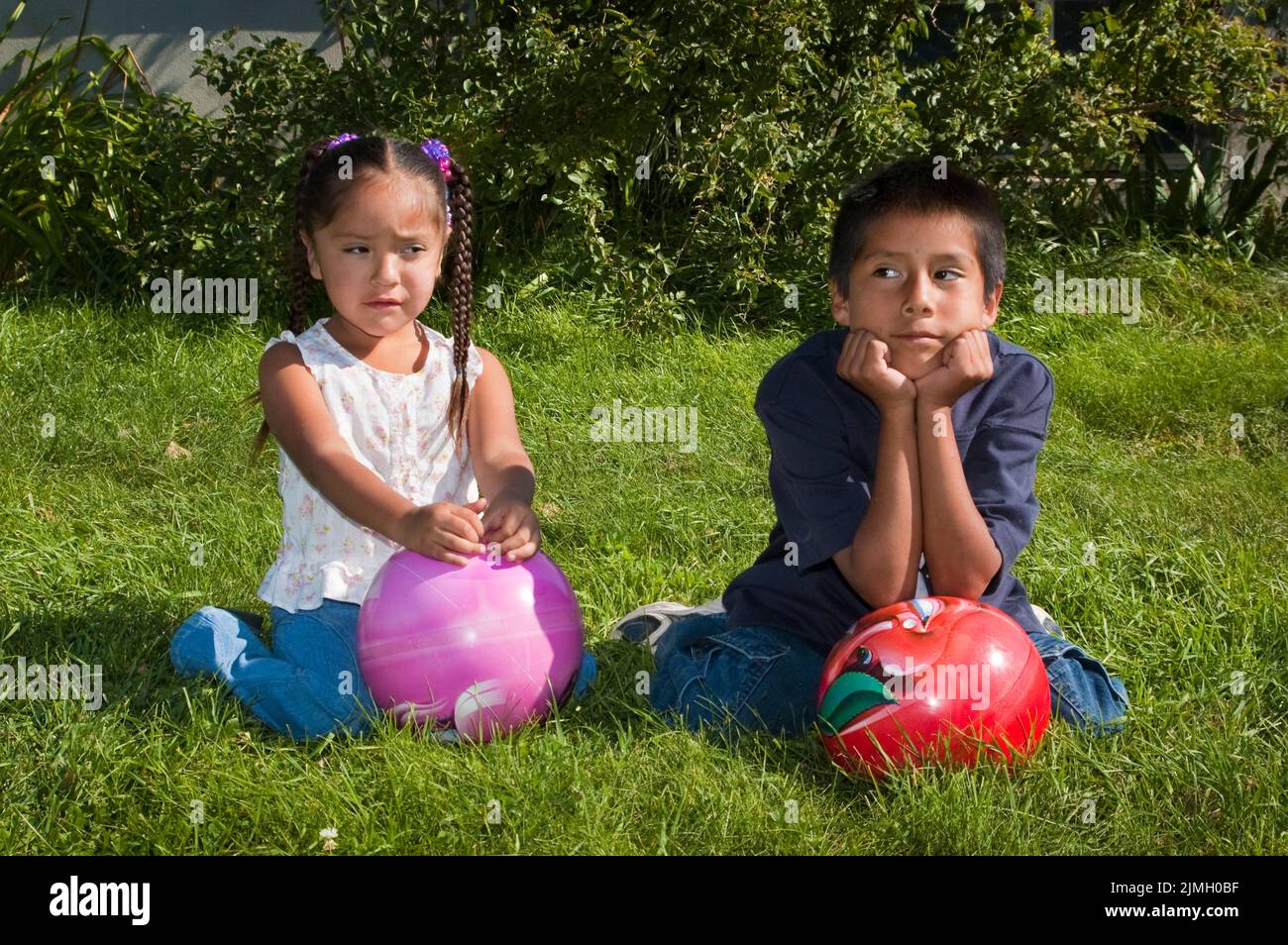 Native American children, brother and sister, have a dispute while ...