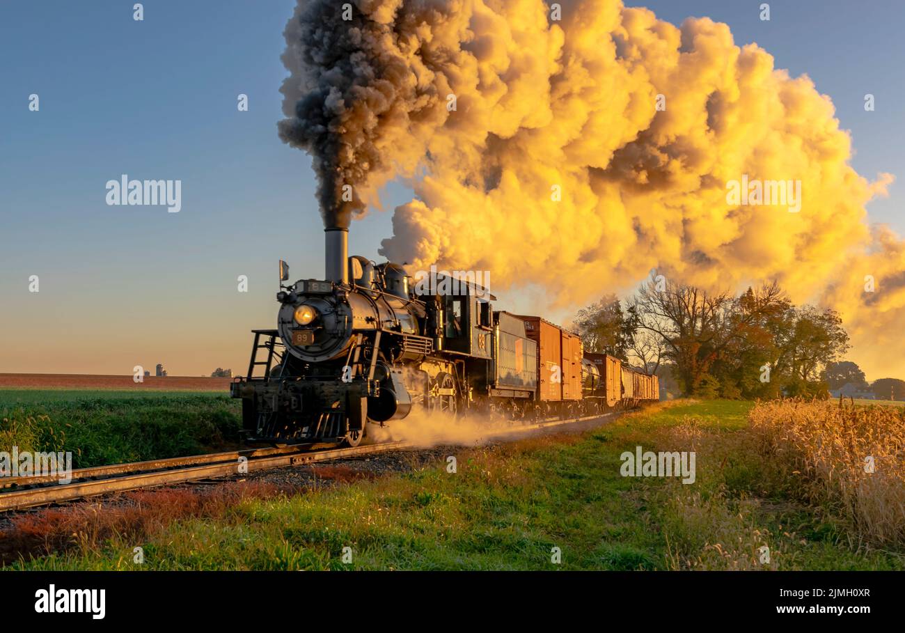 View of an Antique Freight Steam Train Blowing Smoke Approaching Thru ...