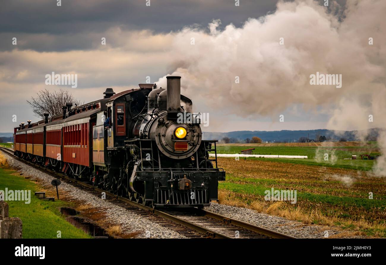 Antique Restored Steam Engine and Coaches Approach Thru Corn Fields ...