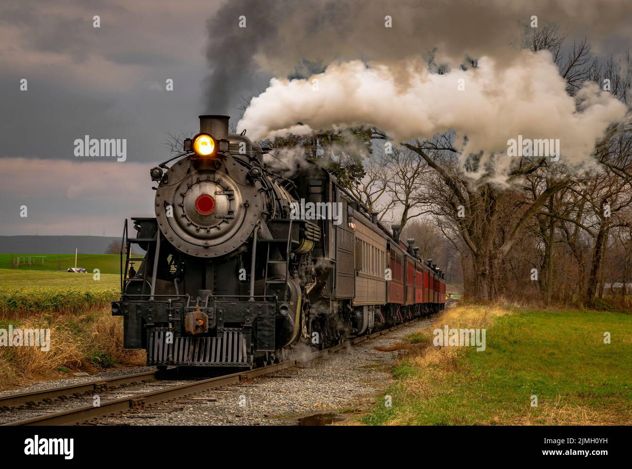 View of an Antique Freight Steam Train Blowing Smoke Approaching Thru ...