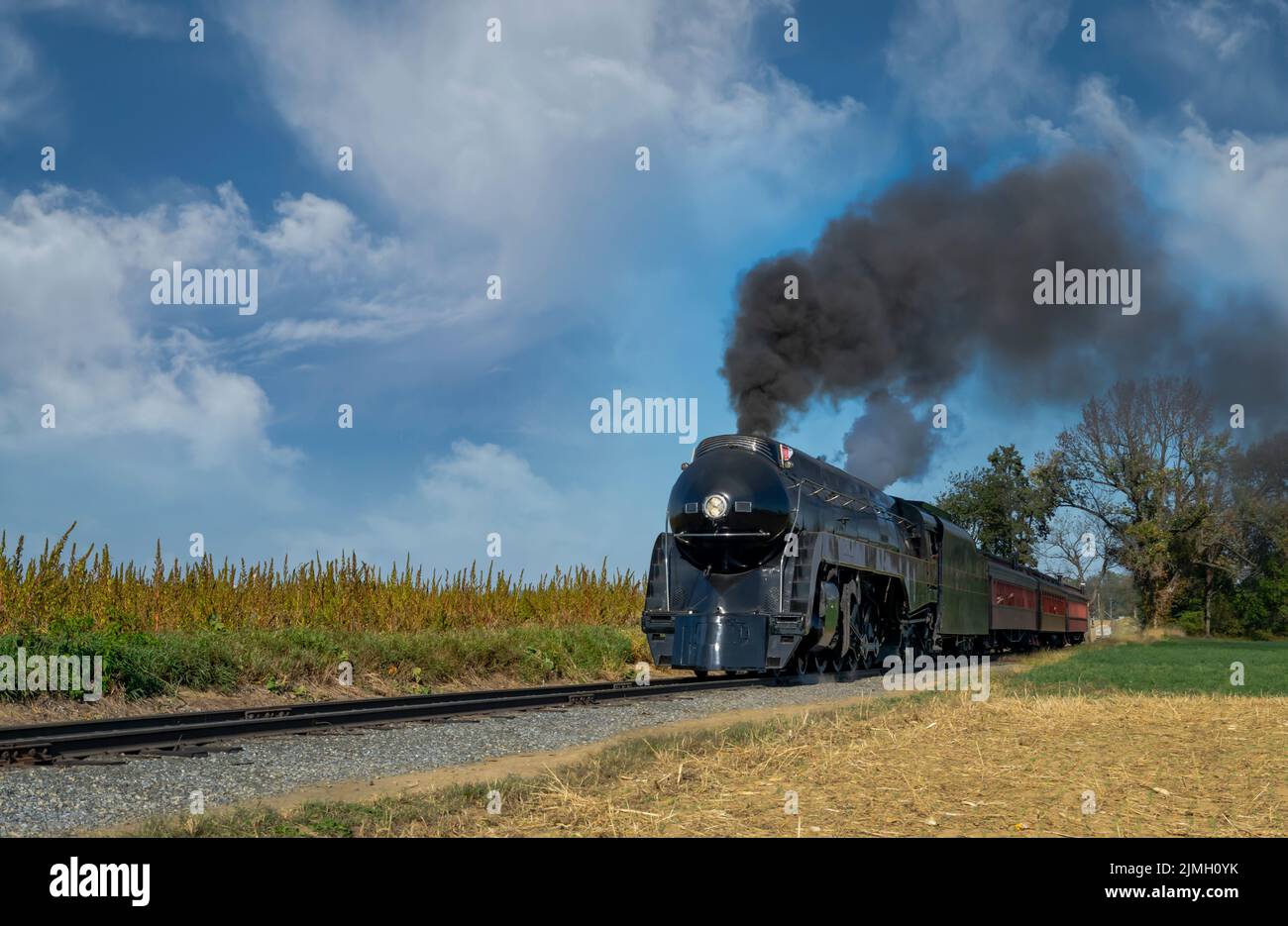 Train moving forward on rail tracks hi-res stock photography and images ...