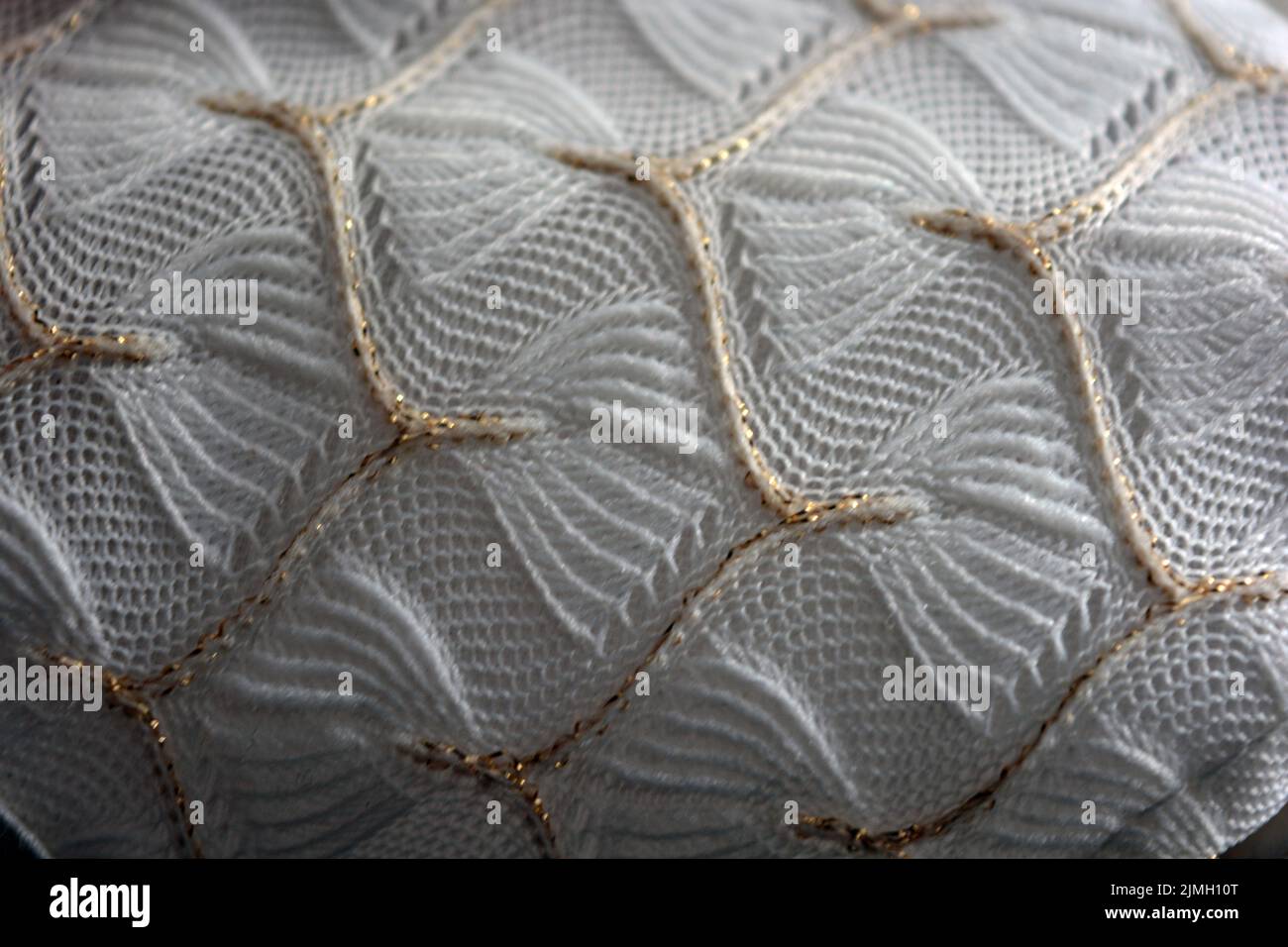 Beautiful white woven fabric with an intriguing pattern of dense white ...