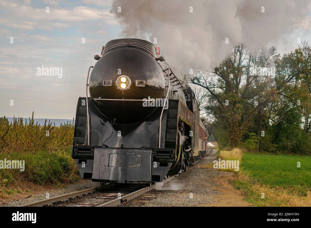Antique Restored Steam Engine Approaching on Some Old Rail Road Tracks ...