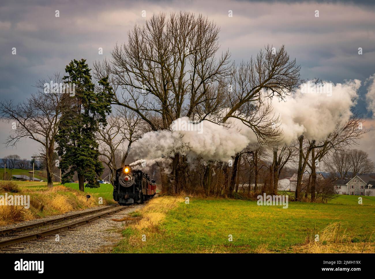View of an Antique Freight Steam Train Blowing Smoke Approaching Thru ...