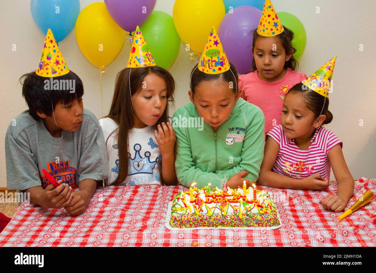 Native American children's birthday party is celebrated with a ...