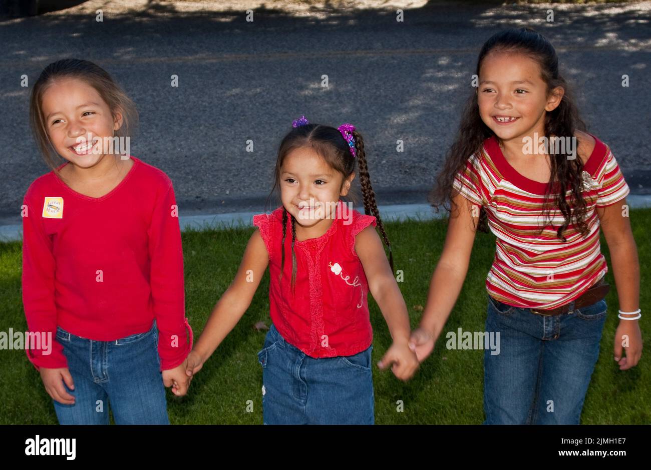 Three Native American elementary age girls who are friends and sister ...