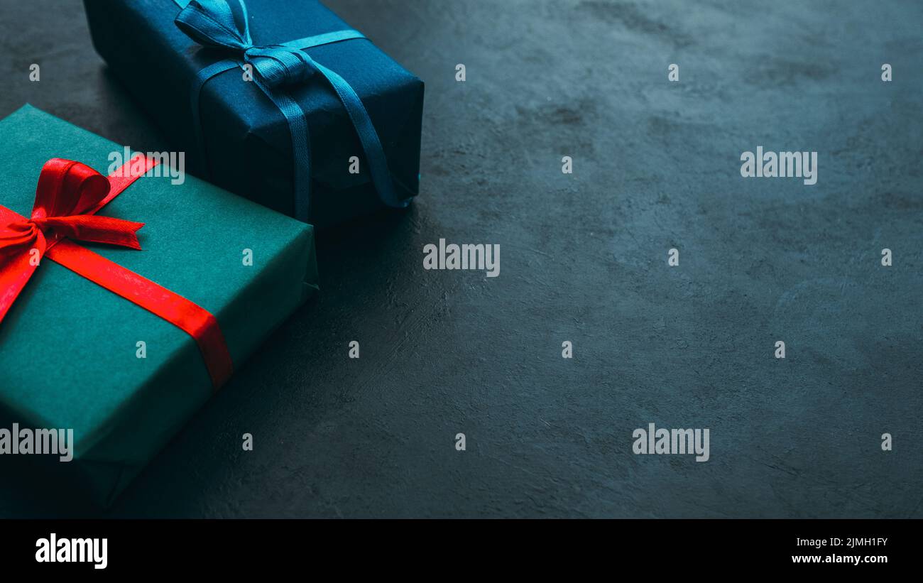 special occasion gift boxes teal blue background Stock Photo - Alamy