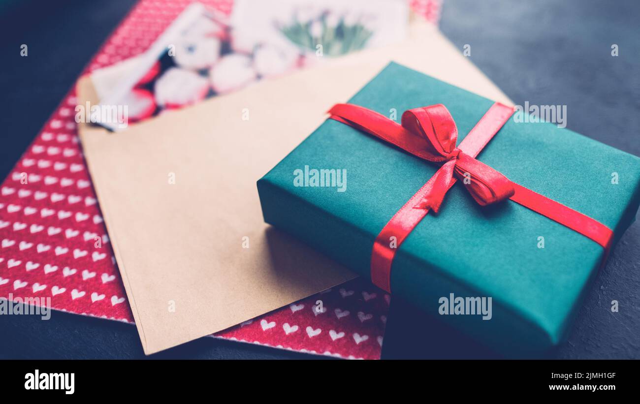 romantic birthday surprise teal blue gift box Stock Photo - Alamy