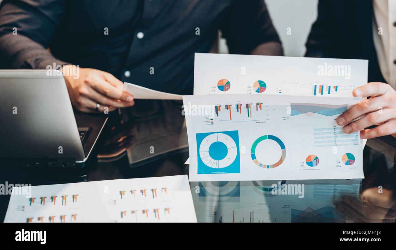 marketing statistics research business men charts Stock Photo - Alamy