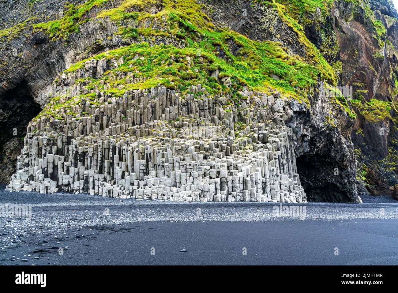 View of Reynisdrangar, the basalt sea stacks at the mountain ...
