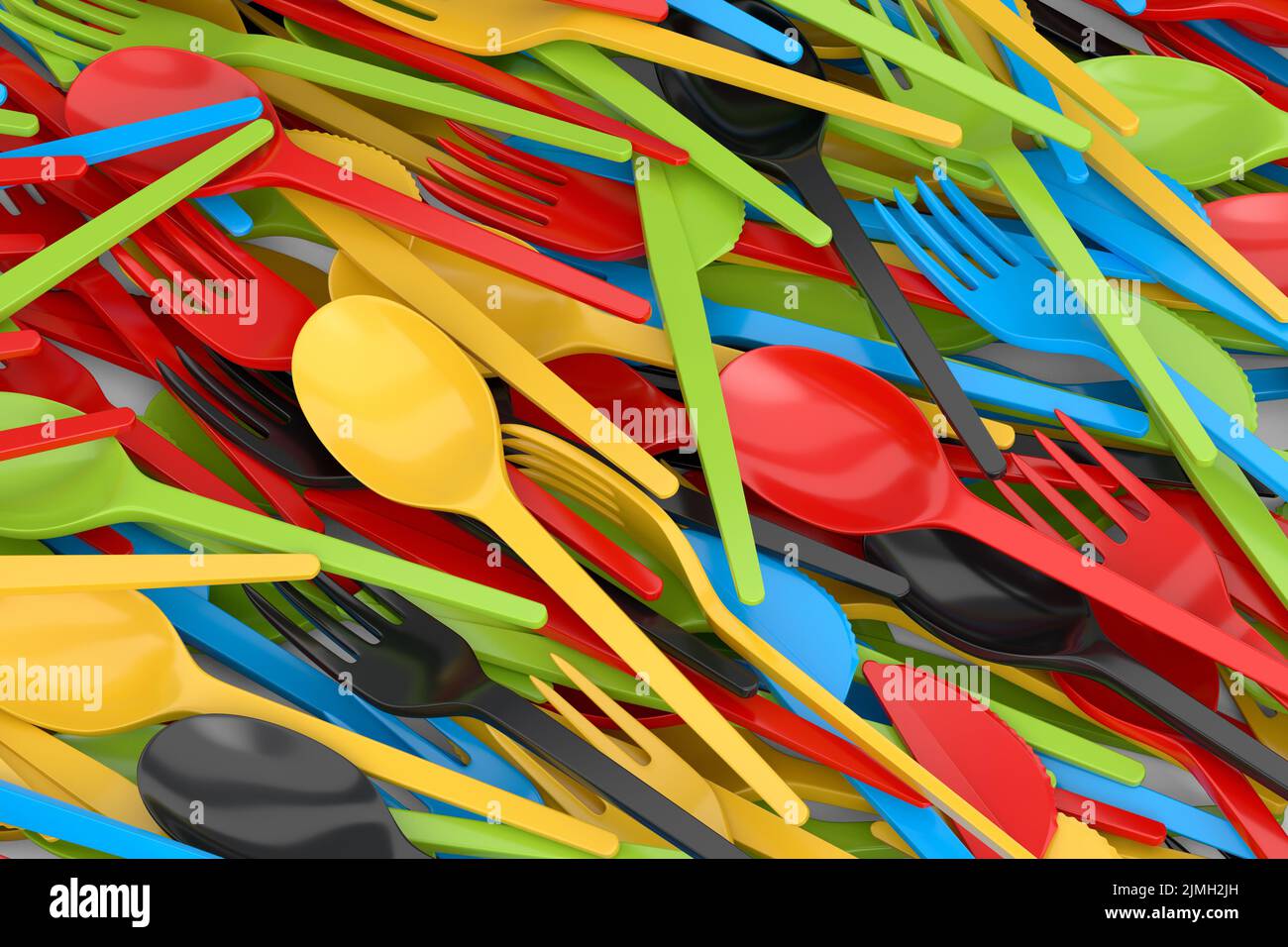 Heap of disposable utensils like spoon, fork and knife on white ...