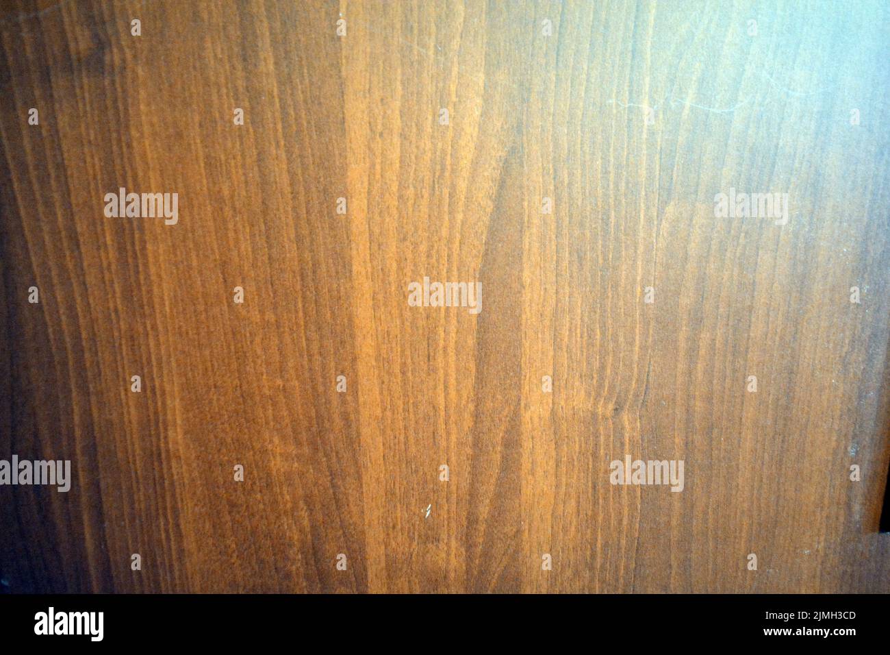 Unusual brown background made of natural wood with an interesting ...