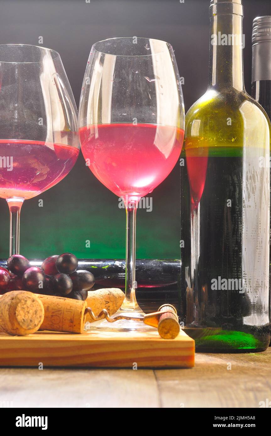 Glass and bottle of wine on the table Stock Photo - Alamy