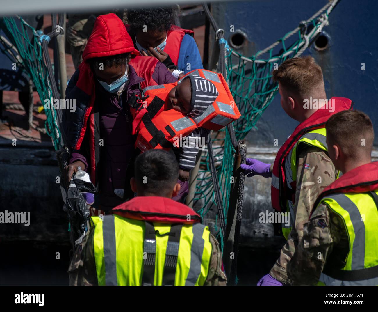 Child migrants brought ashore by royal navy hi-res stock photography ...