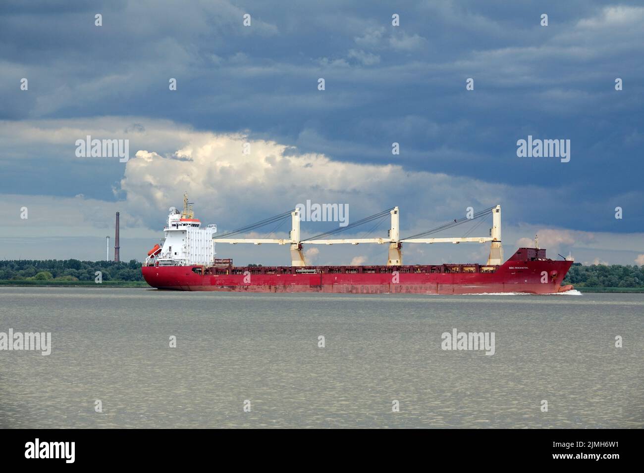 General Cargo Ship on the Lower Elbe Stock Photo - Alamy