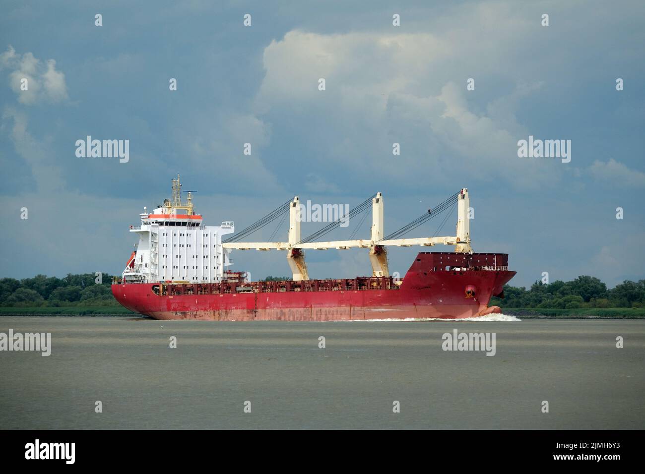 General Cargo Ship on the Lower Elbe Stock Photo - Alamy
