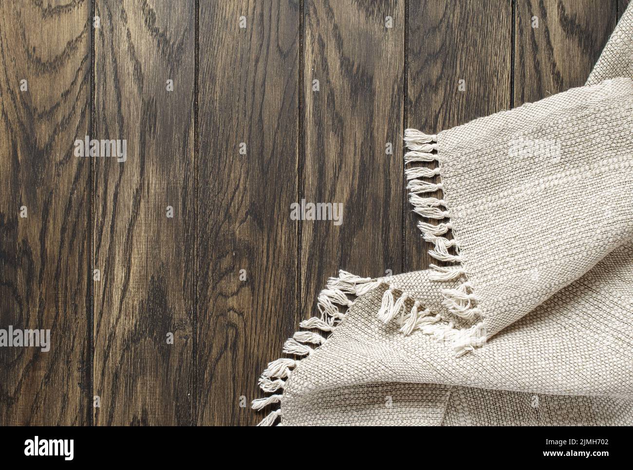 Gray handmade tablecloth from right corner oak table top view. Food ...