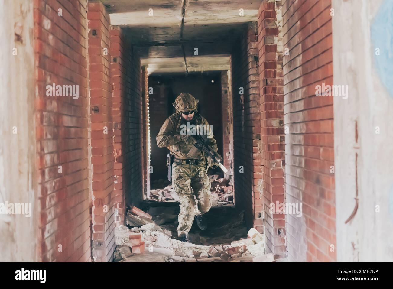 A bearded soldier in uniform of special forces in a dangerous military ...