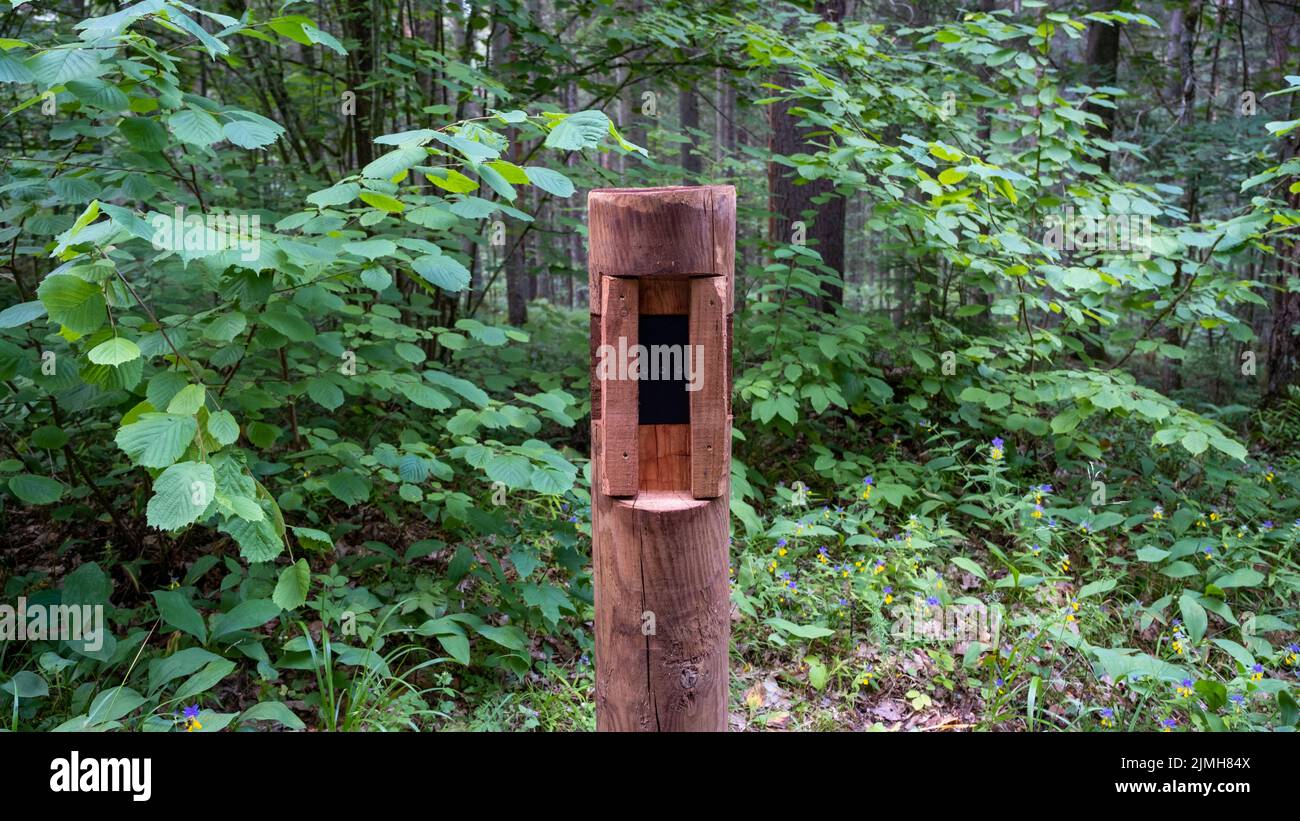 The tourist counter located in the forest on the tourist trail, which ...