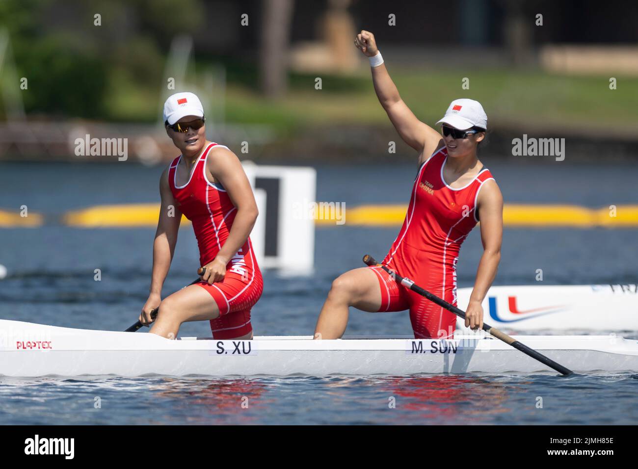 Shixiao Xu, left, and Mengya Sun, of China, react after winning gold in ...