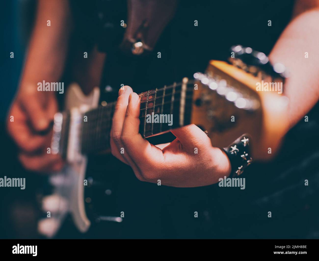 live rock concert punk musician electric guitar Stock Photo - Alamy