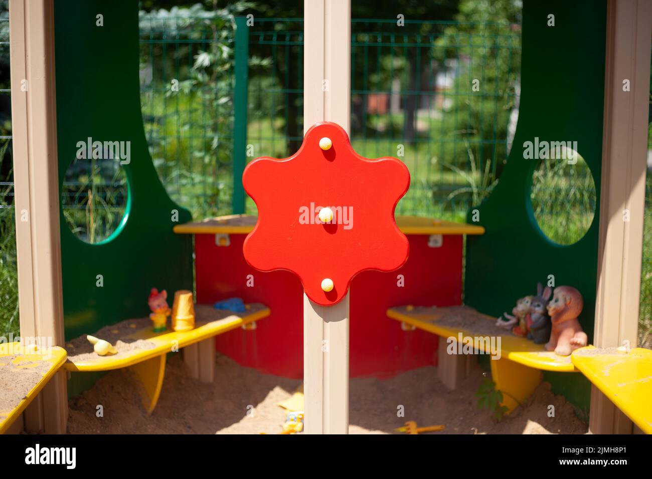 Details of playground for preschoolers. Children's area on street. Red ...