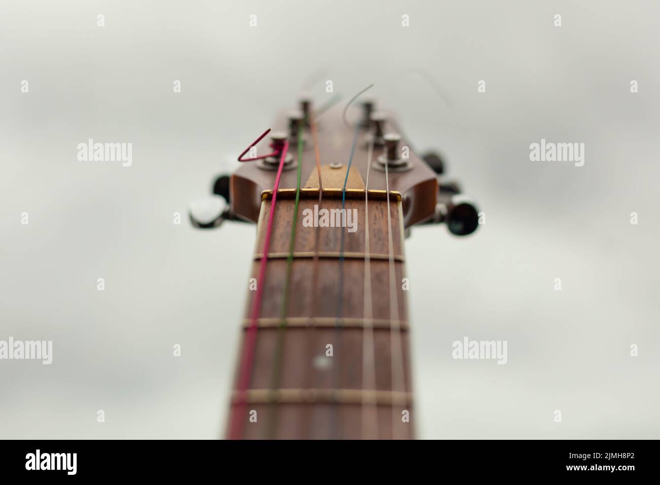 Guitar neck. Acoustic musical instrument. Details of music Stock Photo ...