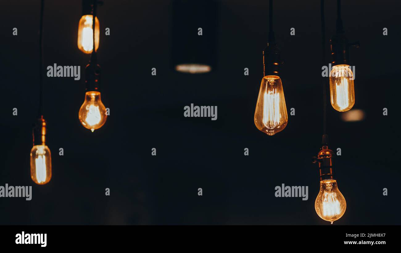 loft interior lighting antique filament bulbs Stock Photo - Alamy