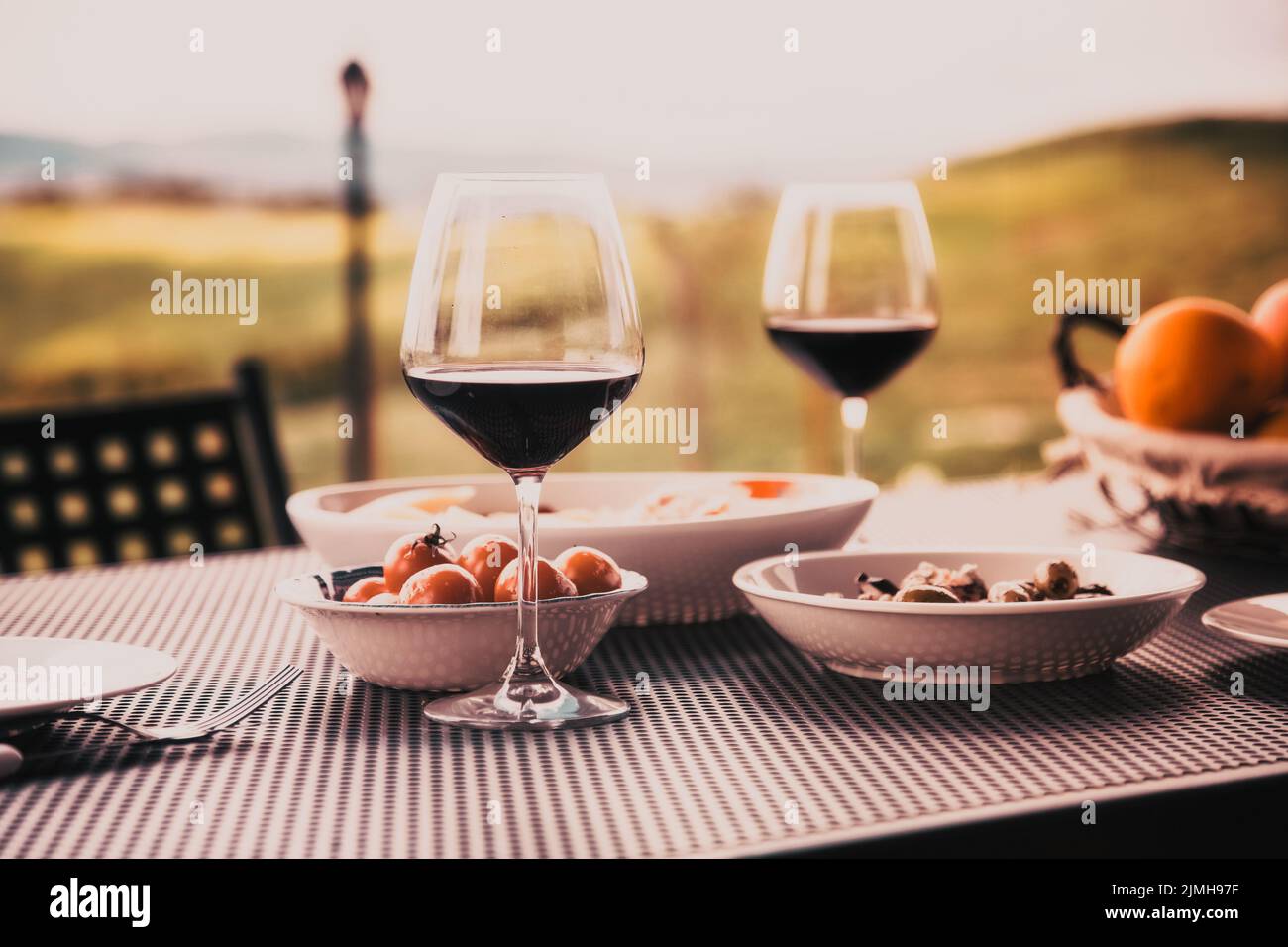 Lunch with a view - table against beautiful landscape in Tuscany Stock ...