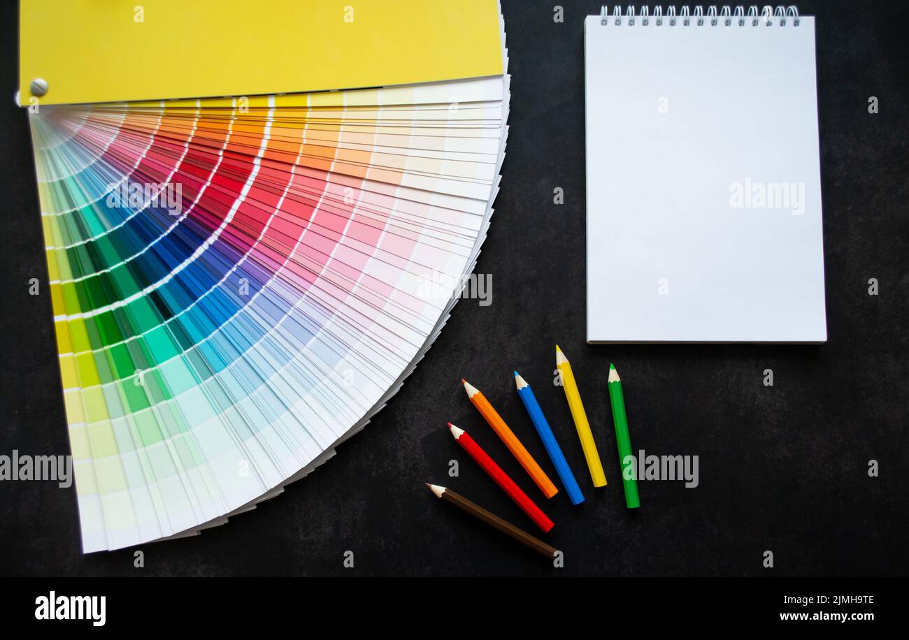 Paper fan paint swatch interior design, wall painting. Black background ...