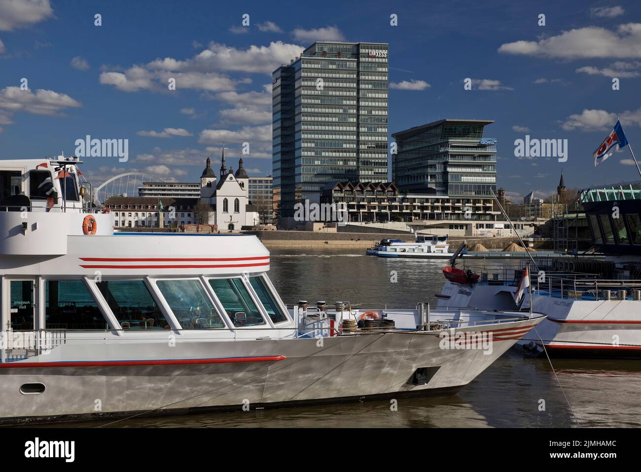 The Rhine with ships and the Lanxess skyscraper, Cologne, North Rhine ...