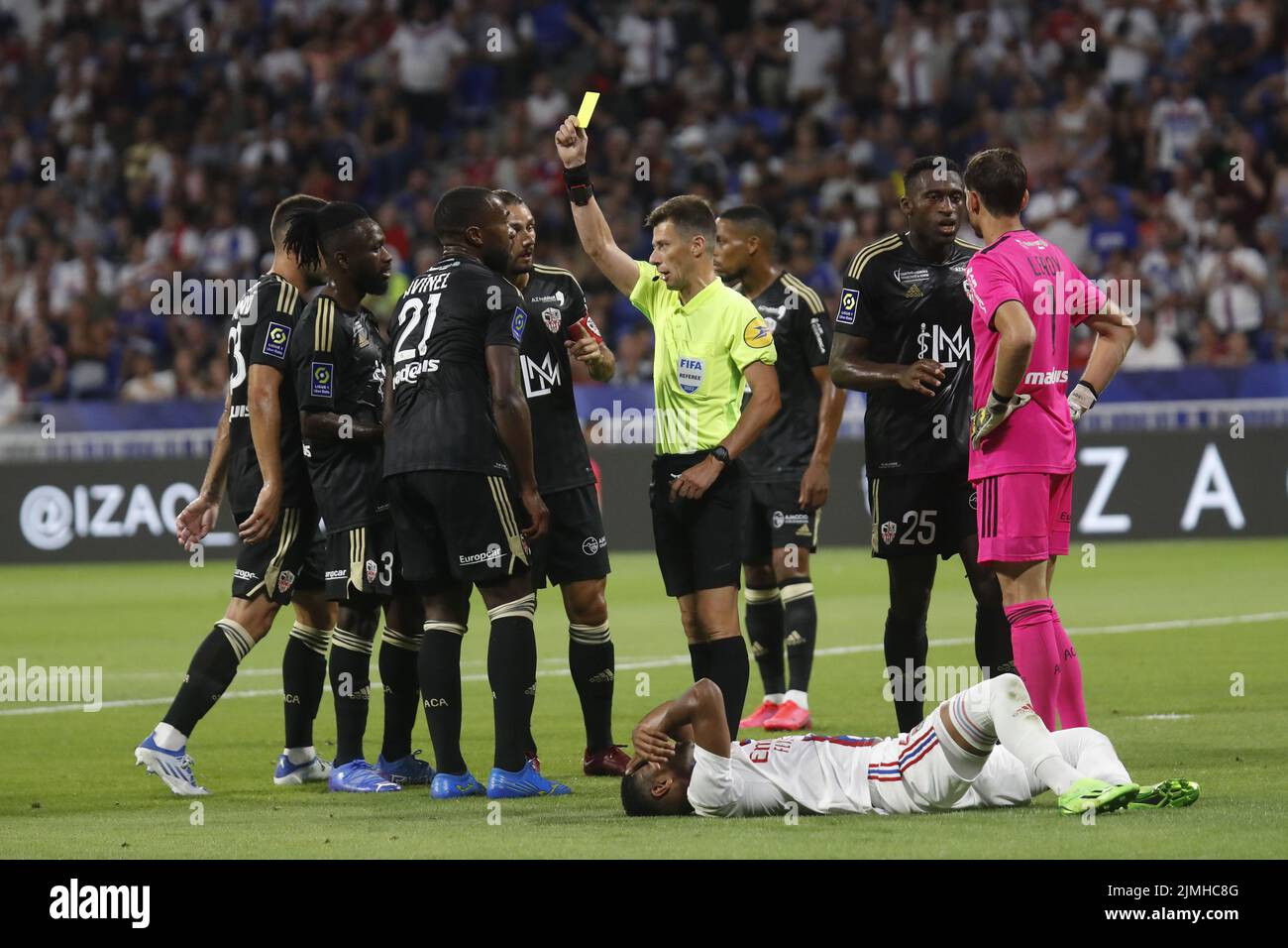 Referee Benoit BASTIEN and Cedric AVINEL of Ajaccio yellow card during ...