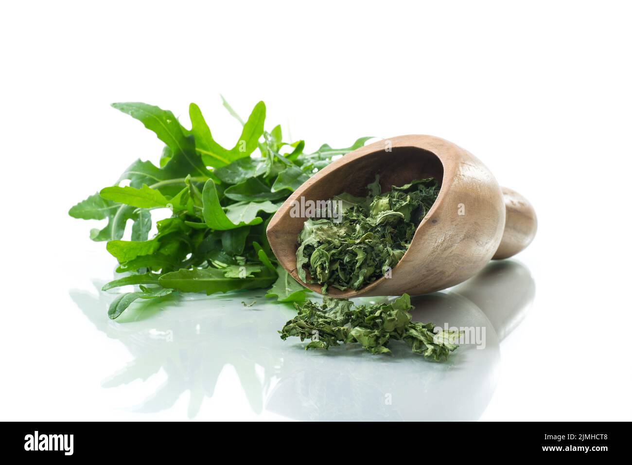 dried green organic arugula, seasoning, isolated on white background ...