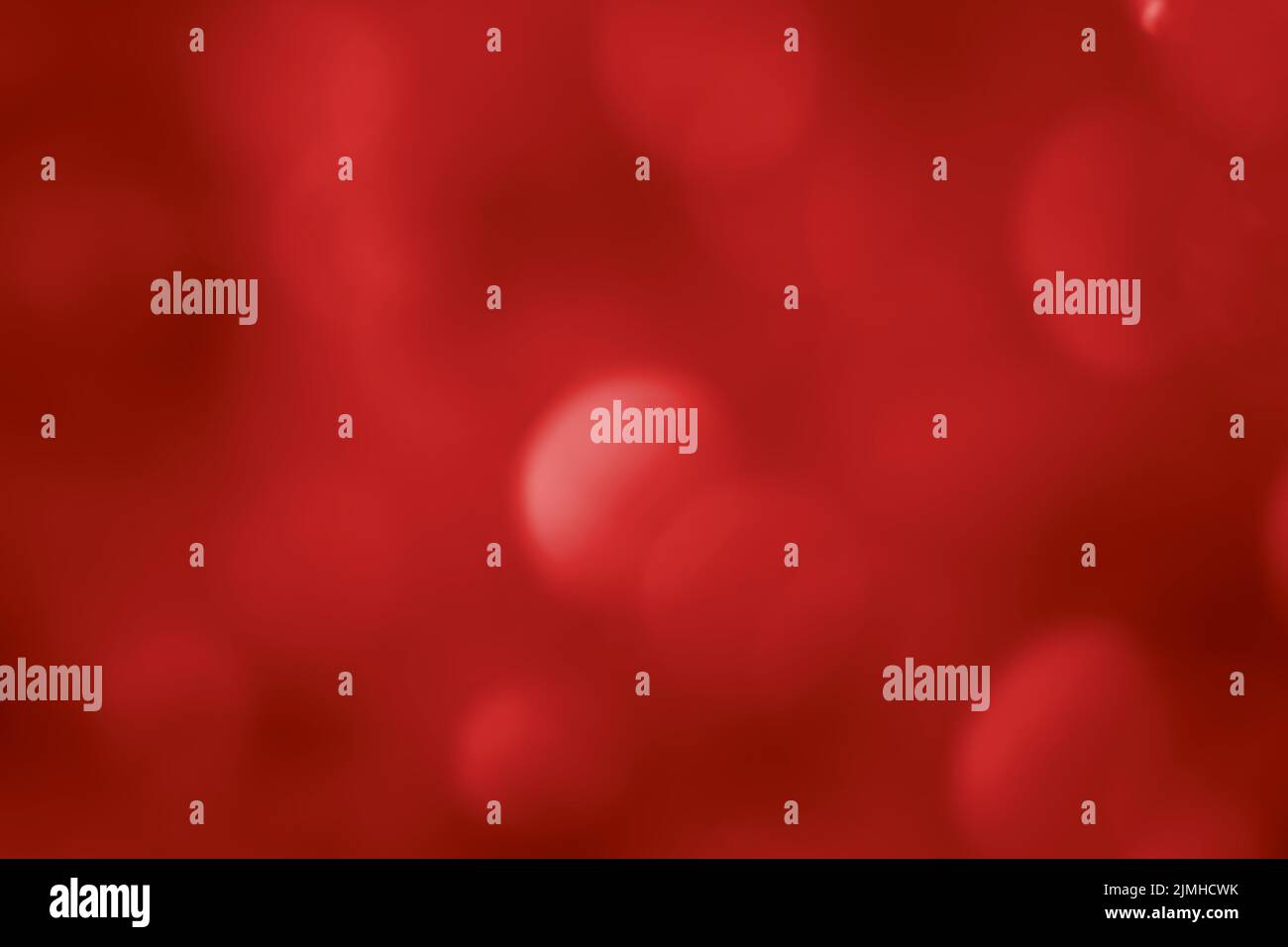 defocused red lens flare round specks effect Stock Photo - Alamy