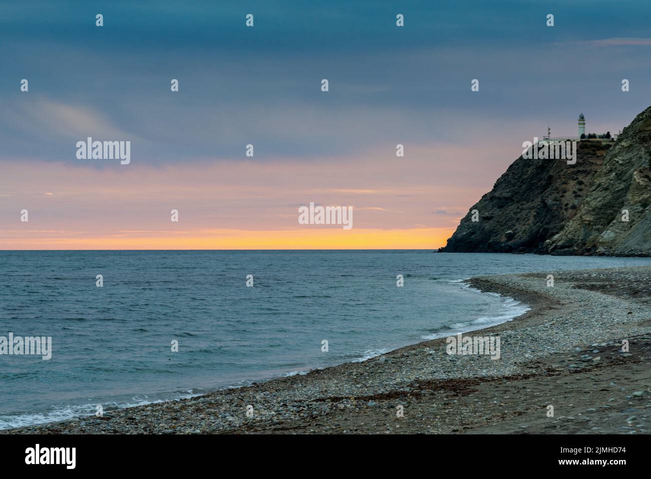 View of La Chucha Beach and the lighthouse of Cabo Sacratif in ...