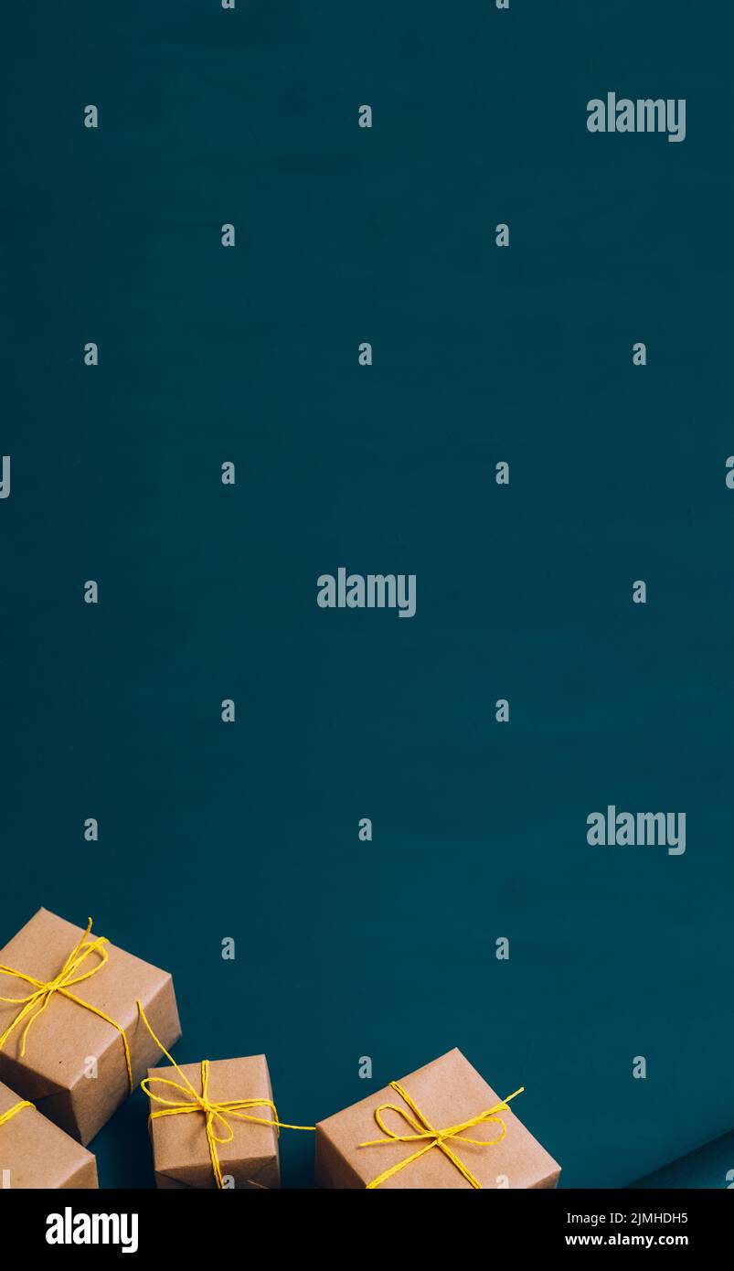 festive greeting card beige gift boxes teal blue Stock Photo - Alamy