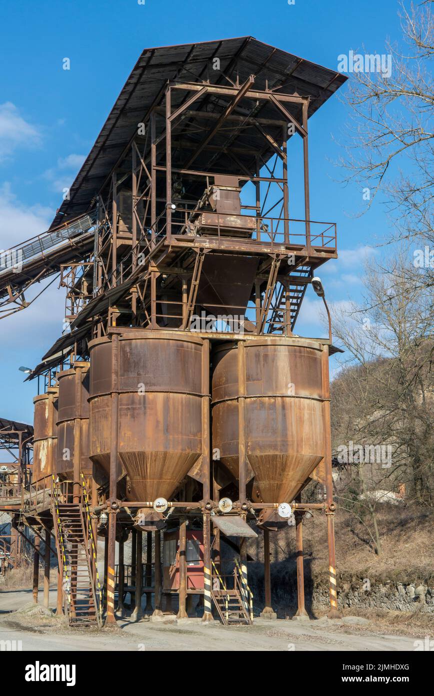 An old gravel quarry. Mining and quarrying equipment. Granite gravel ...