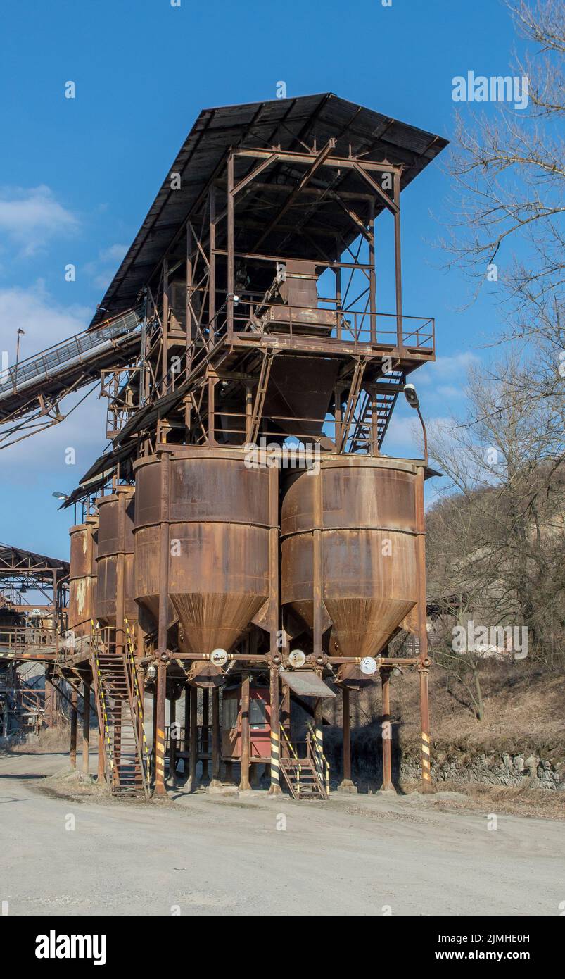 An old gravel quarry. Mining and quarrying equipment. Granite gravel ...