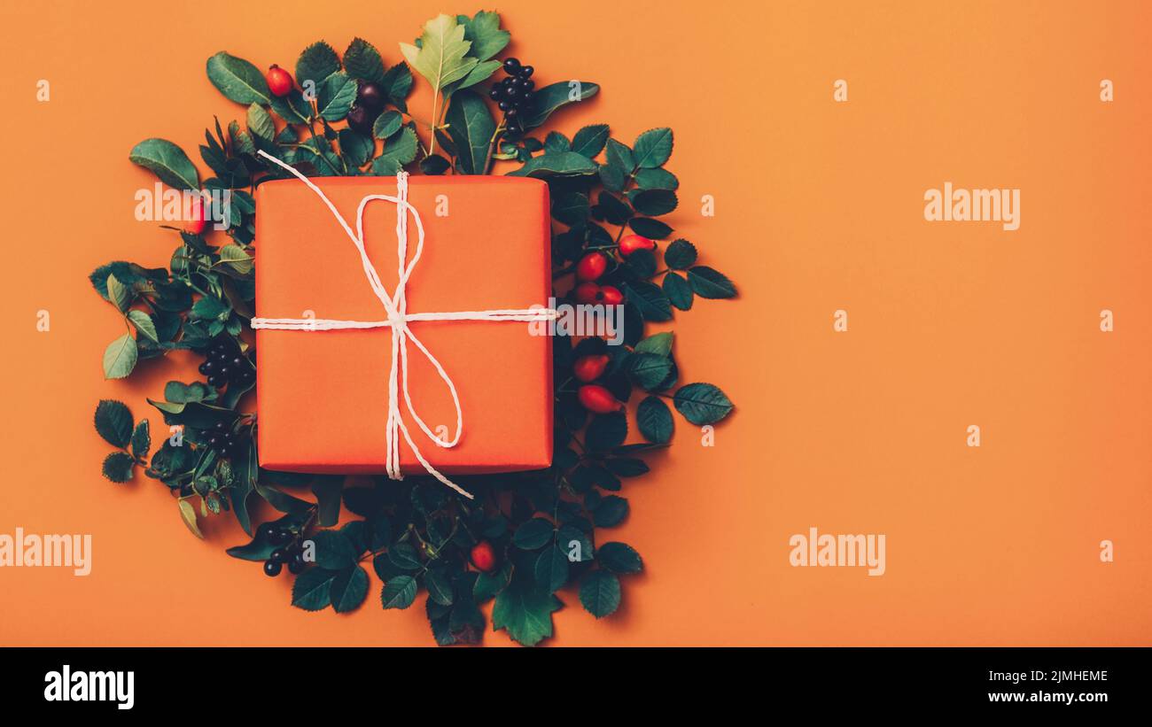 floral art craft gift box orange background Stock Photo - Alamy