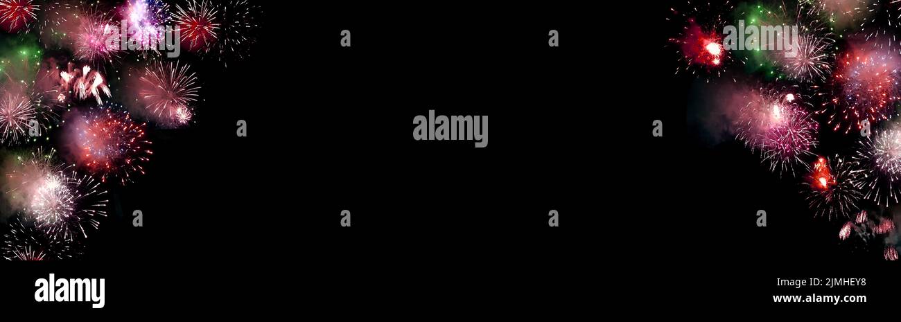 Vivid colorful fireworks border on black banner background with copy ...