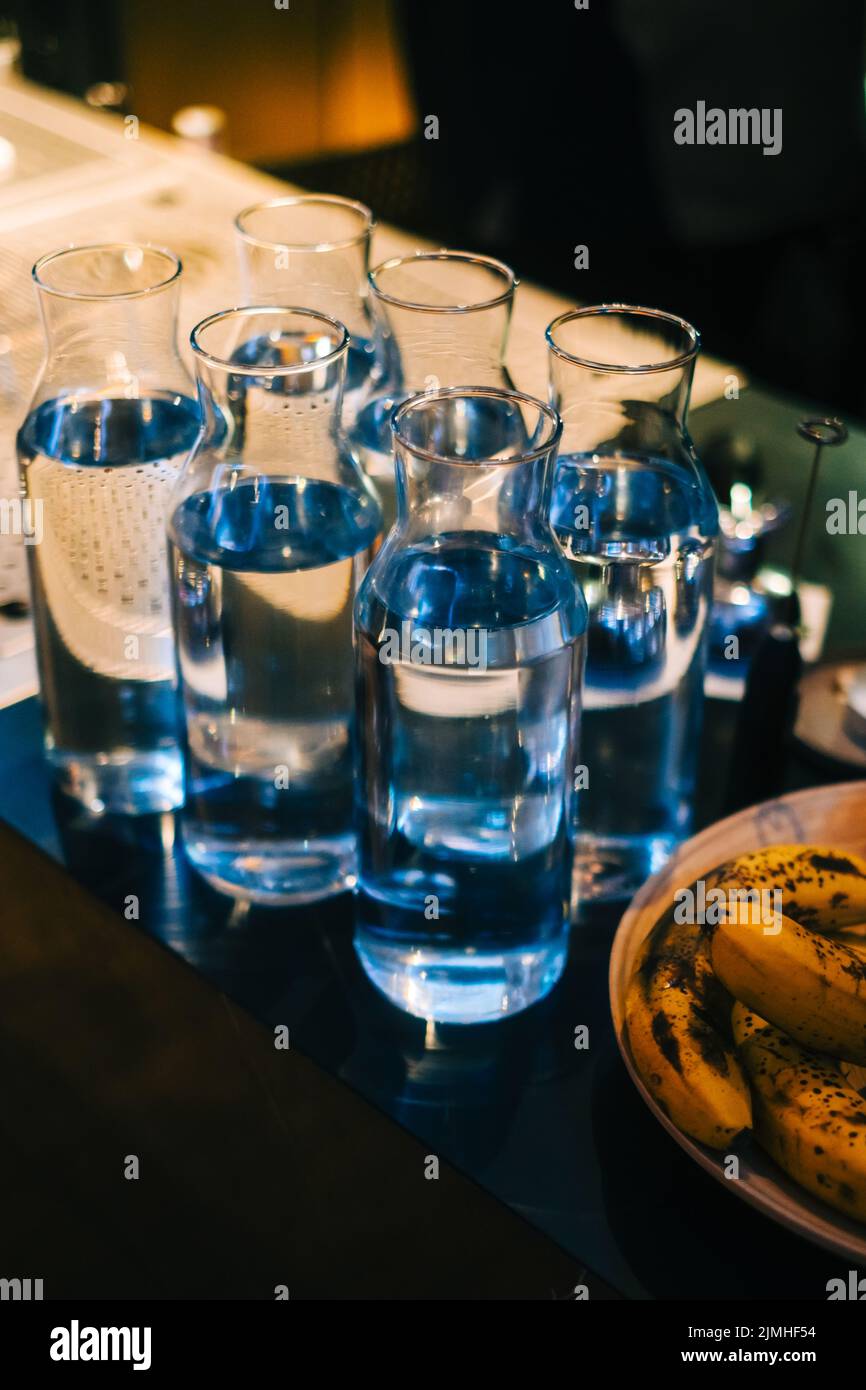 Glass bottles with water on the bar counter in asian restaurant Stock ...