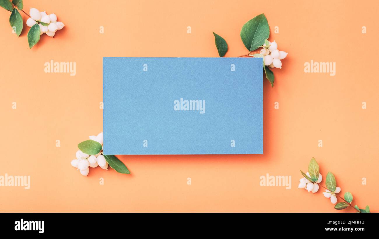 festive greeting card blue paper peach background Stock Photo - Alamy