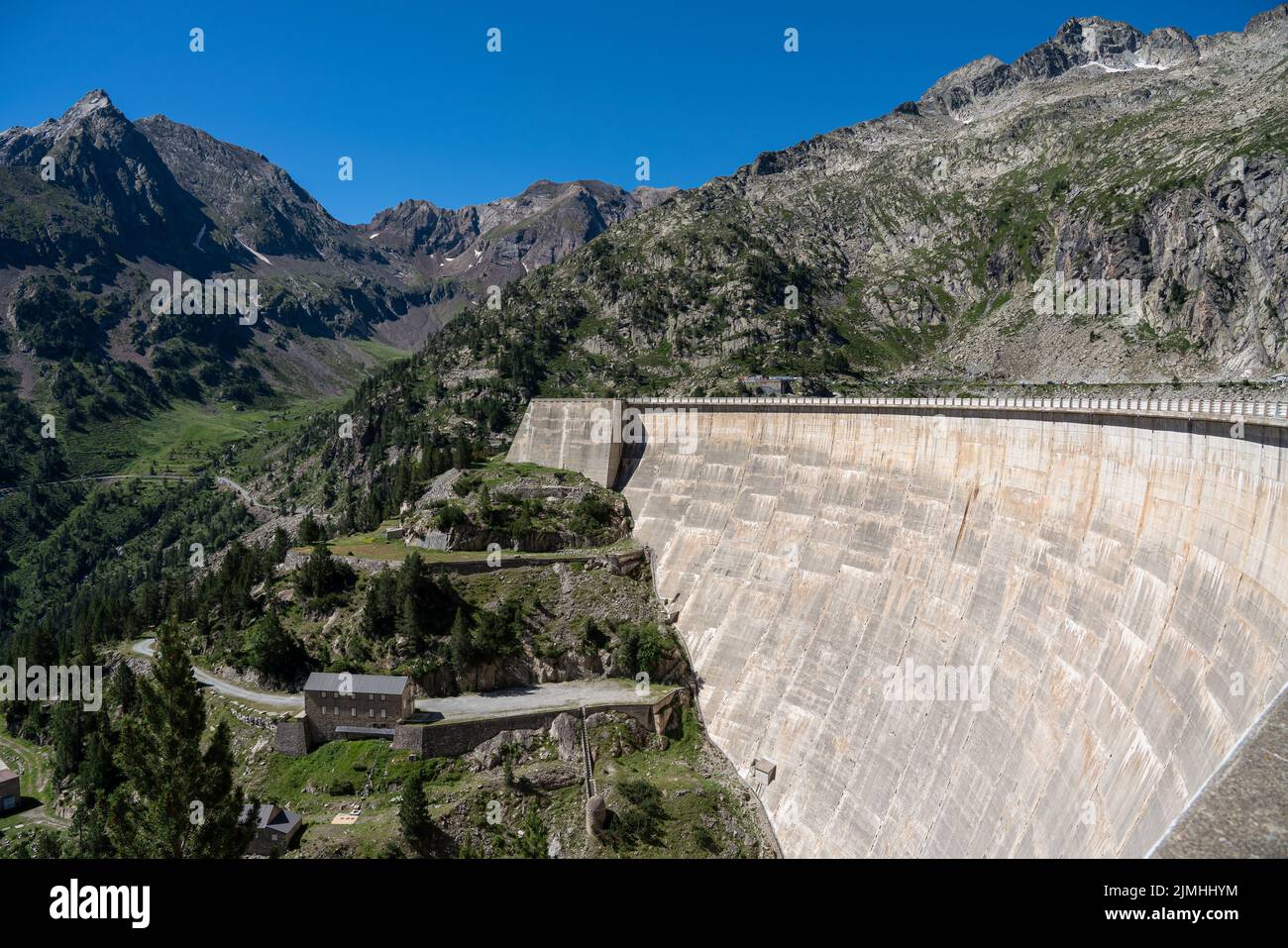 Large concrete reservoir dam wall in sunshine, Barrage dam and Lac de ...