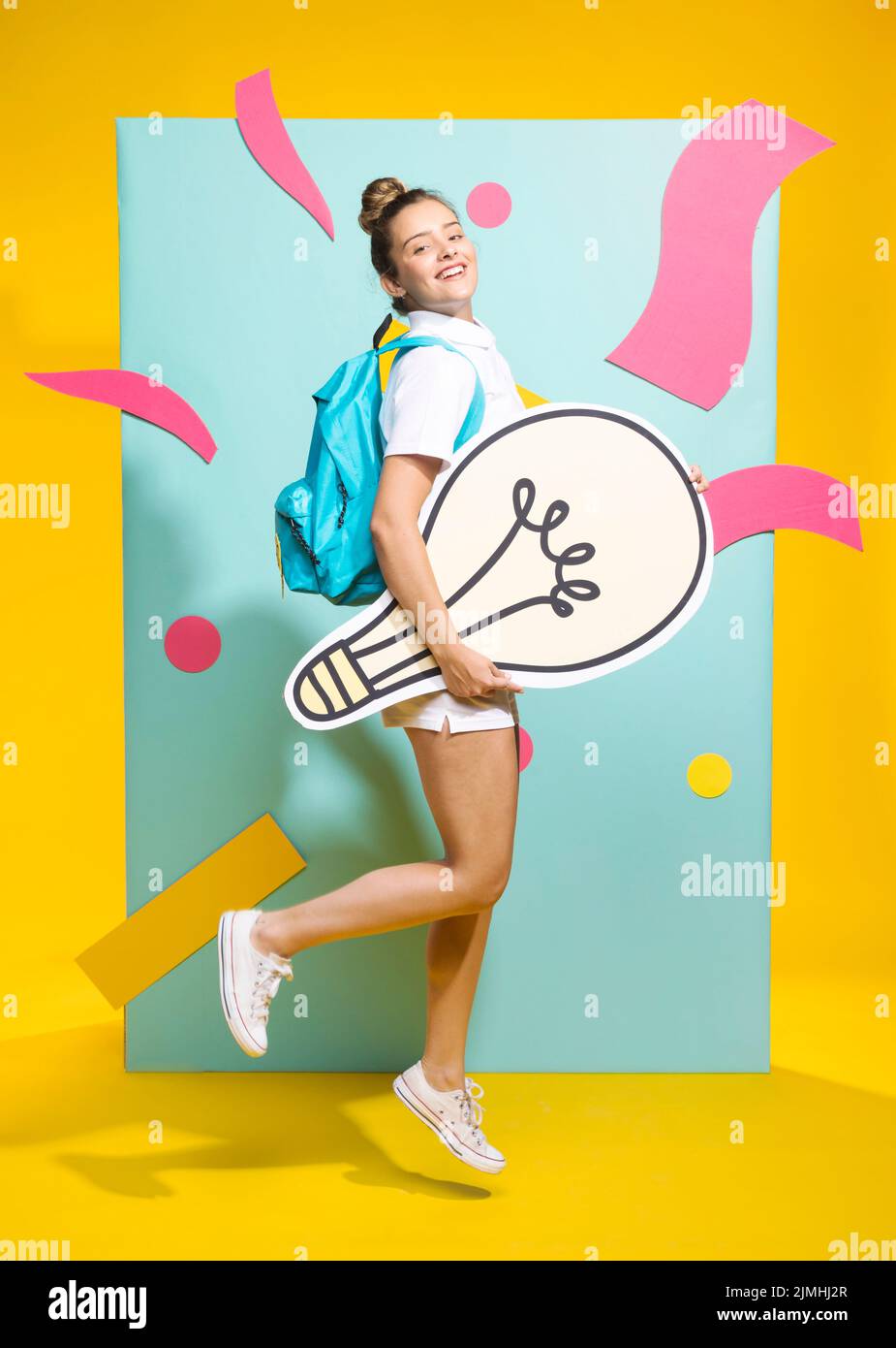 Portrait schoolgirl with big light bulb Stock Photo - Alamy