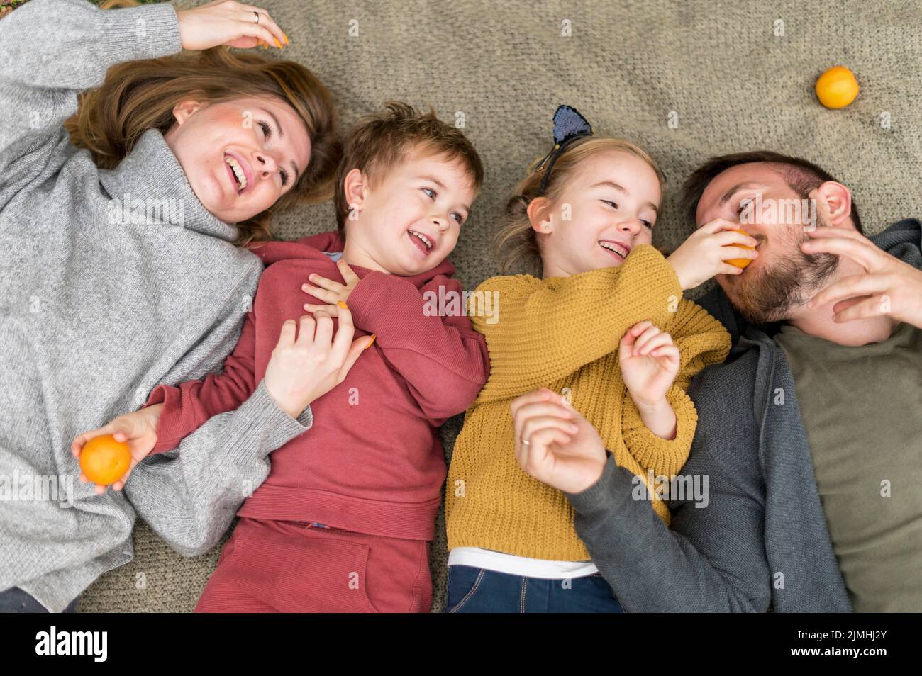 Top view happy family having fun Stock Photo - Alamy