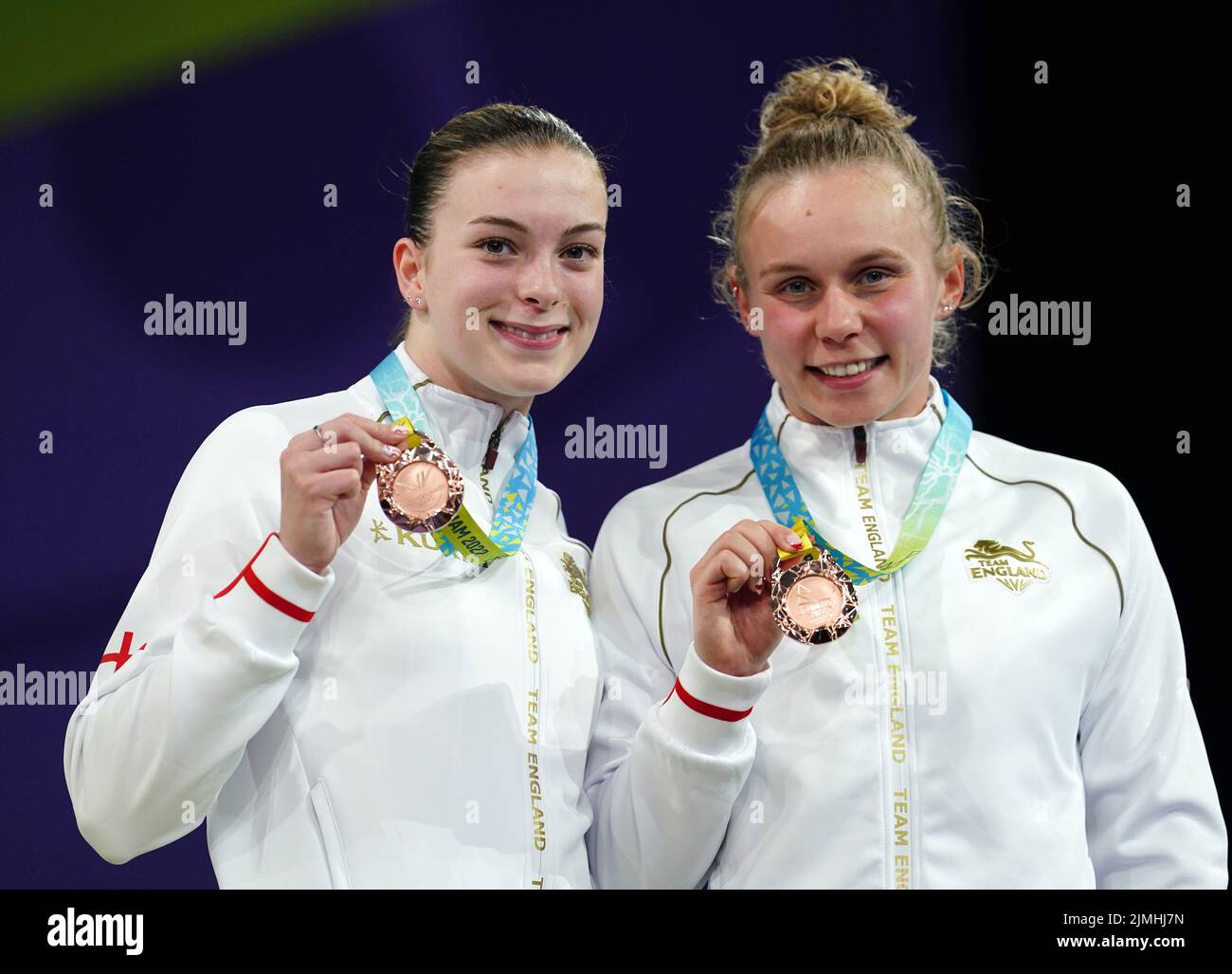 England's Robyn Birch (right) and Emily Martin on the podium with their ...