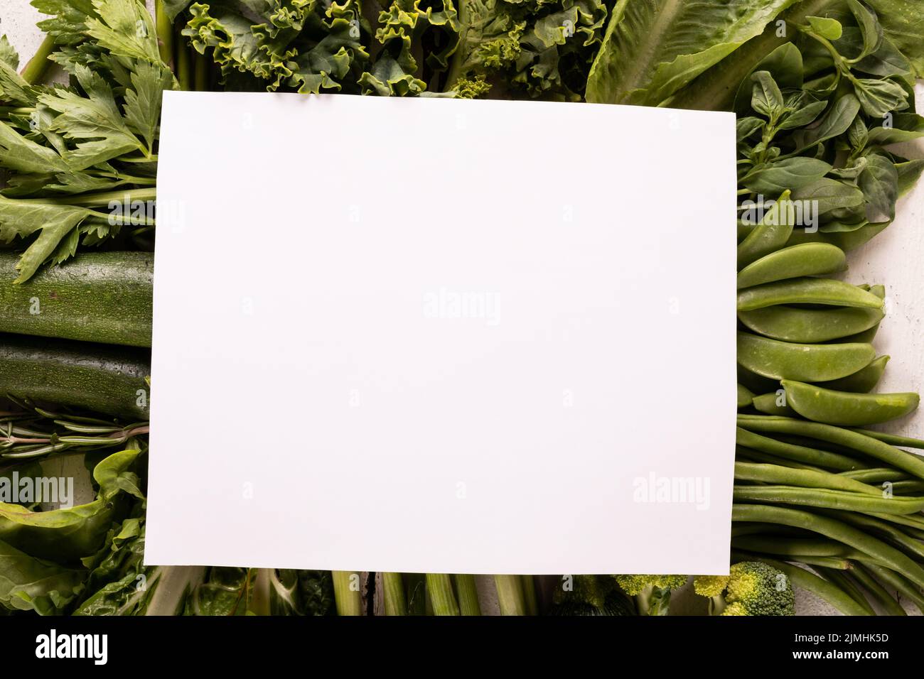 Overhead view of fresh green vegetables on table with copy space Stock ...