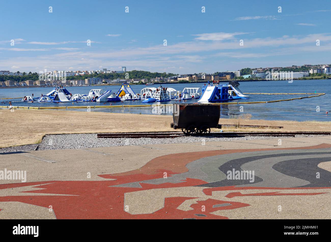 Coal truck artwork installaCardiff Aqua Park inflatable obstacle course ...