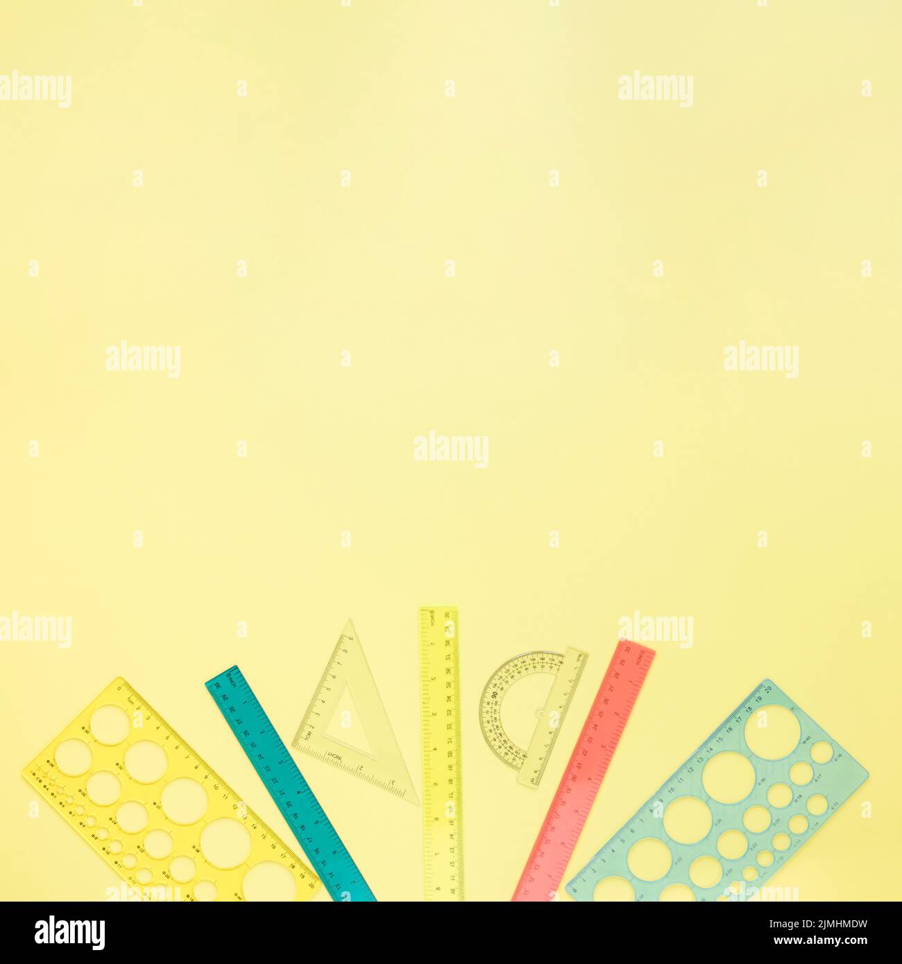 Variety rulers copy space background Stock Photo - Alamy